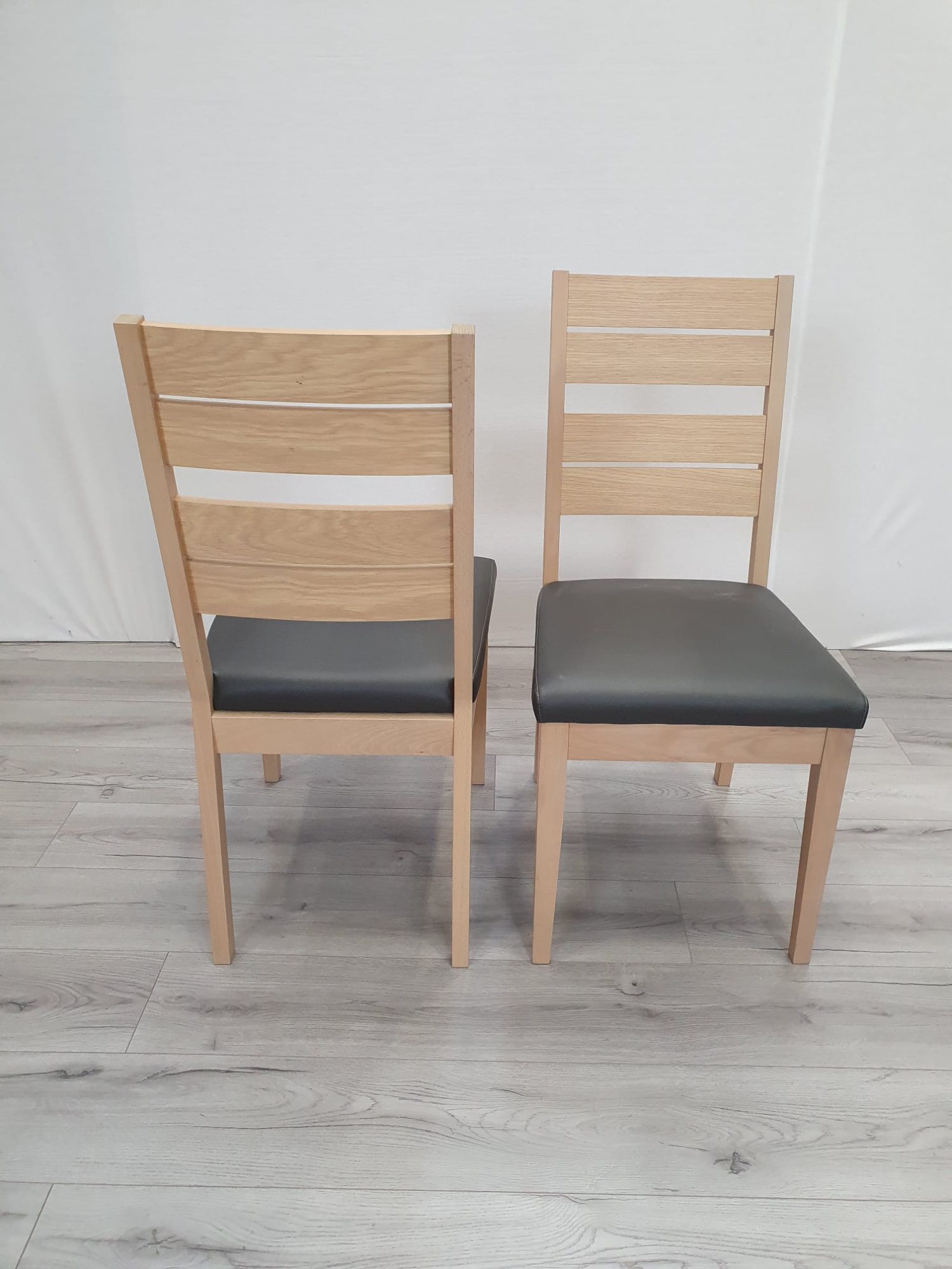 Oakham Scandi Oak Chair | Dark Grey Faux Leather | Pair - Bentley ...